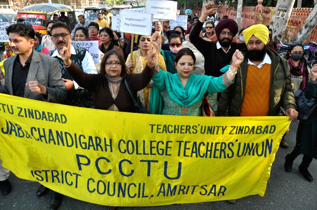 Members of Punjab and Chandigarh College Teachers Union (PCCTU) shout ...