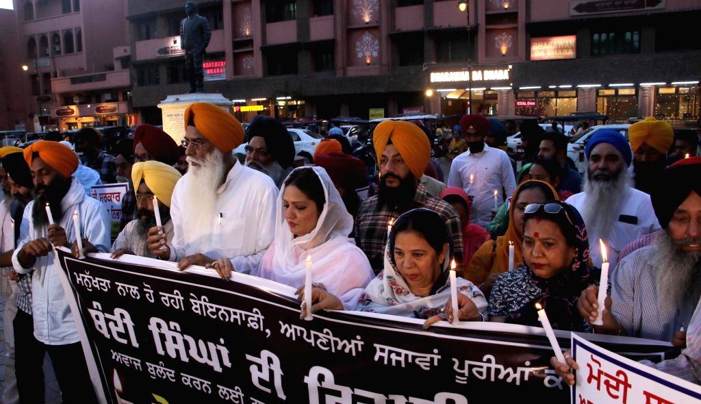 Members of Sikh Students Federation and Human Rights take part in a ...
