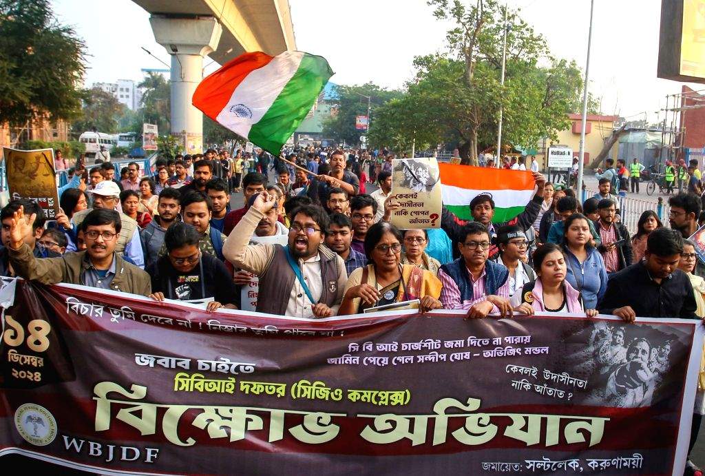 Members of the West Bengal Junior Doctor Front stage a protest in front ...