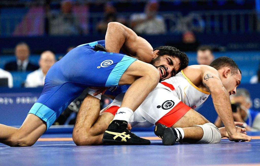 Men's freestyle 57kg bronze medal wrestling match at the Paris Olympics ...