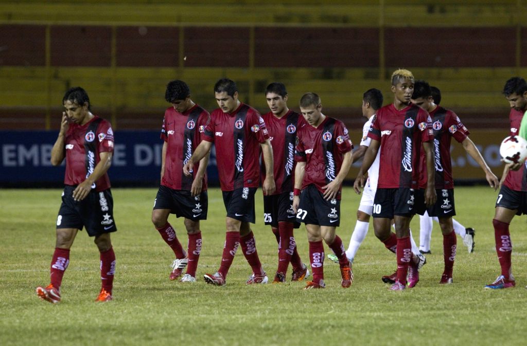 Tijuana's players leave the pitch after finishing their Concacaf ...