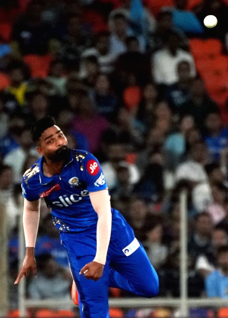 MI bowler Kumar Kartikeya bowls