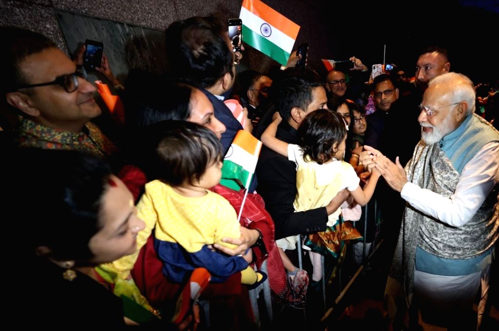 Free Photo : Modi ji we have great hopes from you': Indians welcome PM ...