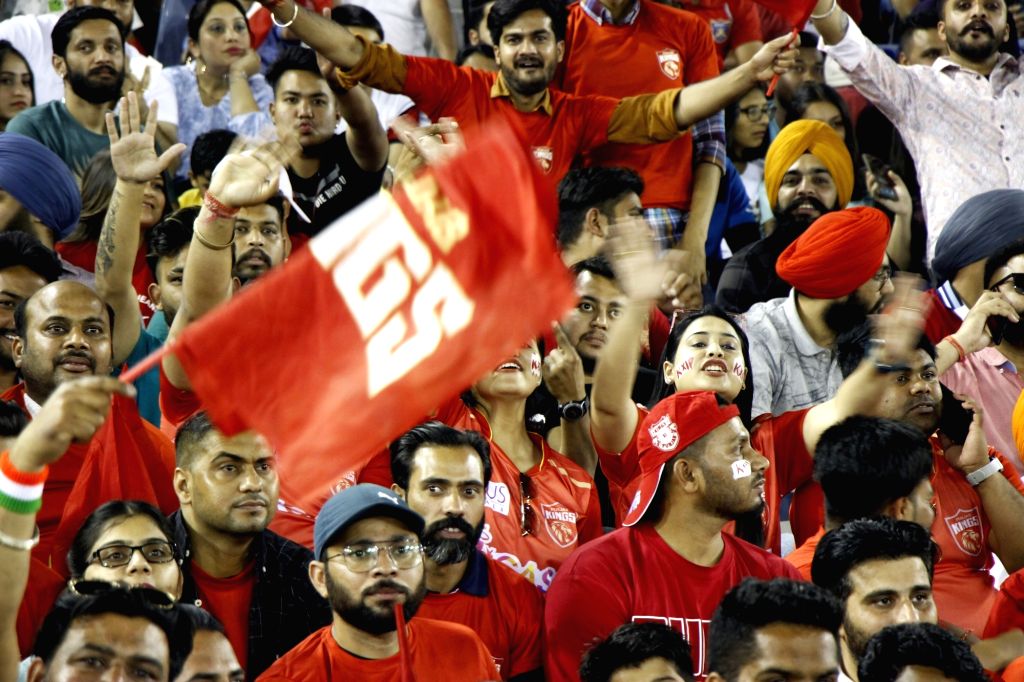Fans cheer during the IPL 2023 match