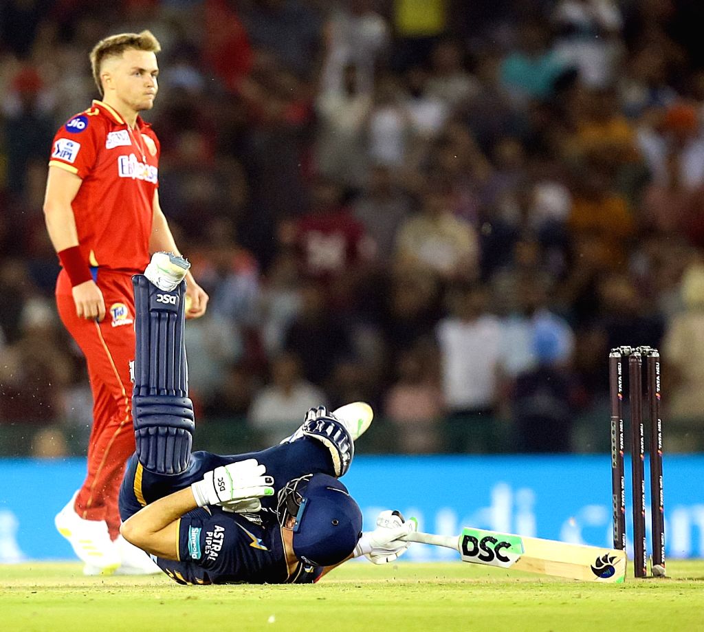 Mohali : Gujarat Titans' David Miller and Punjab Kings' Sam Curran