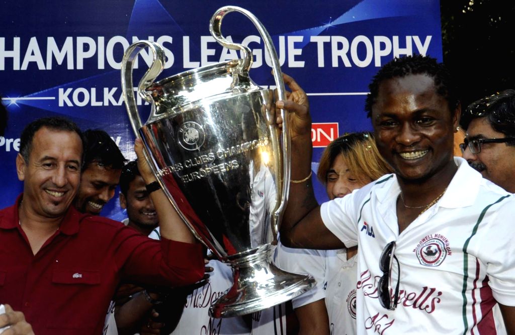Mohun Bagan footballers look at UEFA Champions League Trophy