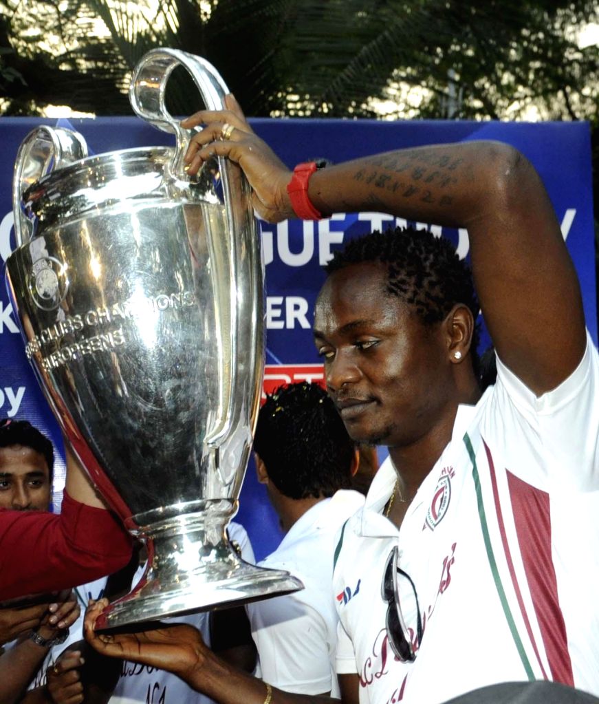 Mohun Bagan footballers look at UEFA Champions League Trophy