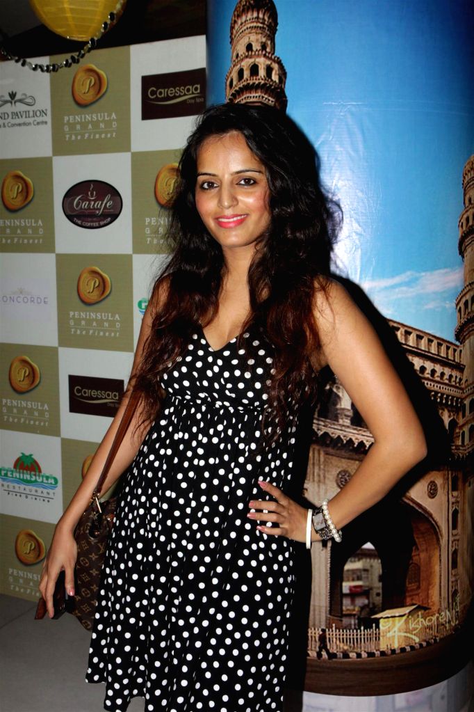 Celebrities attend a cake mixing event