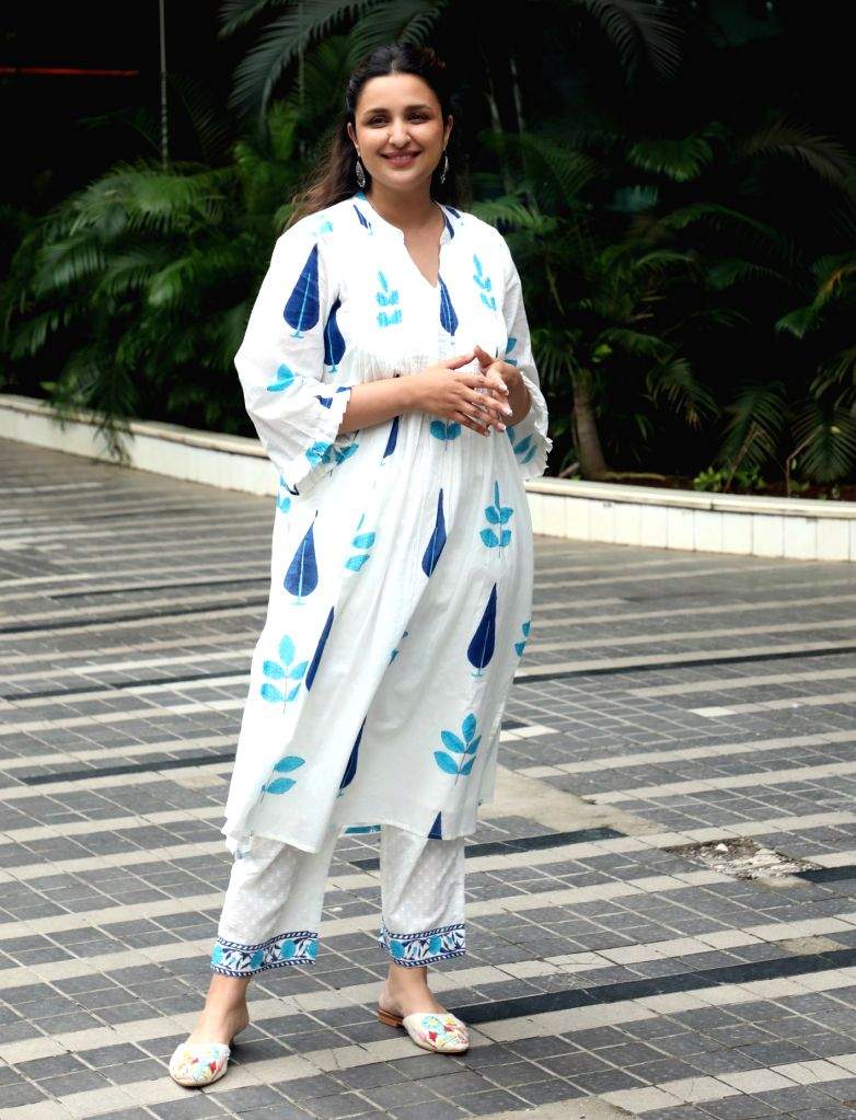 Actress Parineeti Chopra poses for photos