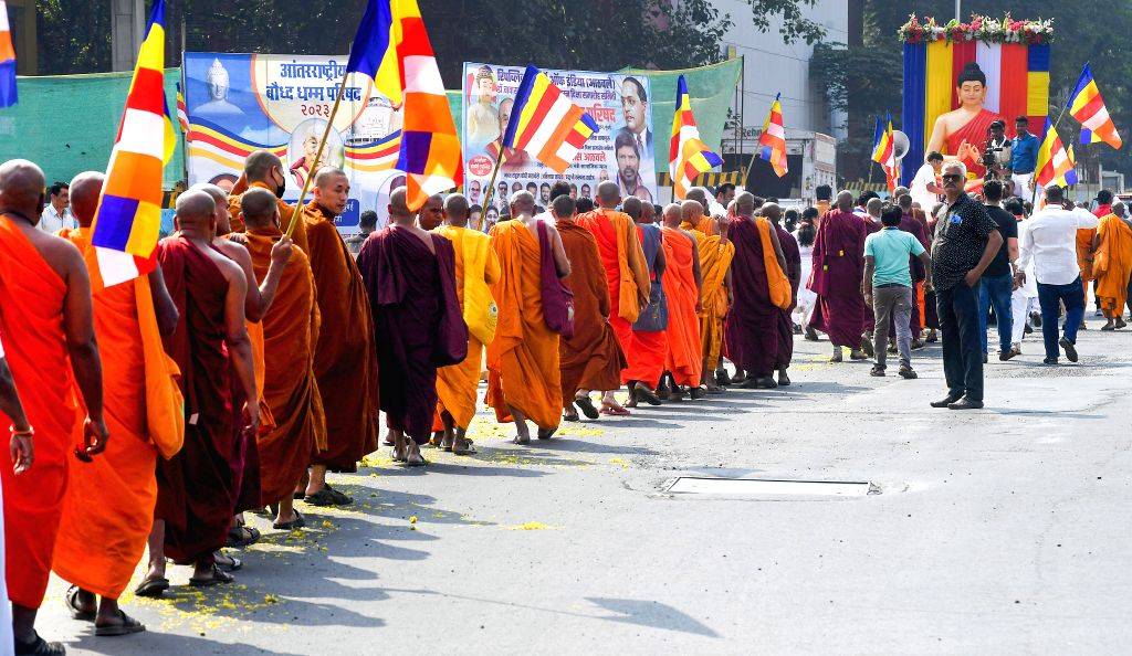 Buddhist monks participate in a rally to embrace Buddhism on the eve of ...
