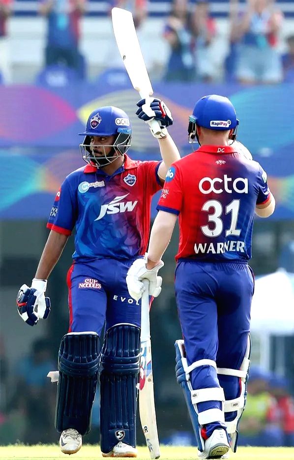Mumbai :DC's Prithvi Shaw celebrating his half-century during the match ...
