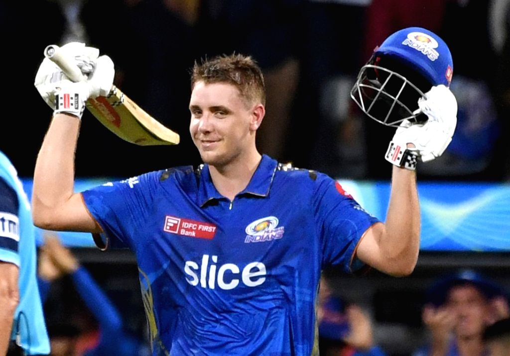 Mumbai : MI's batsman Cameron Green celebrates his century during the ...