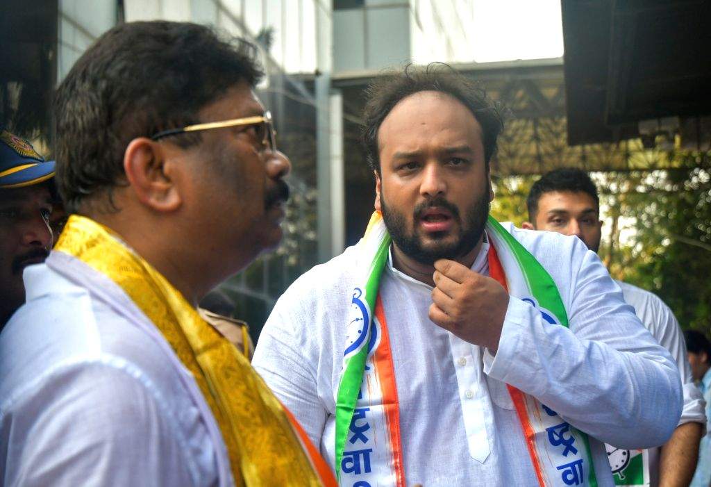 Nationalist Congress Party (NCP) candidate Zishan Siddique arrives to ...
