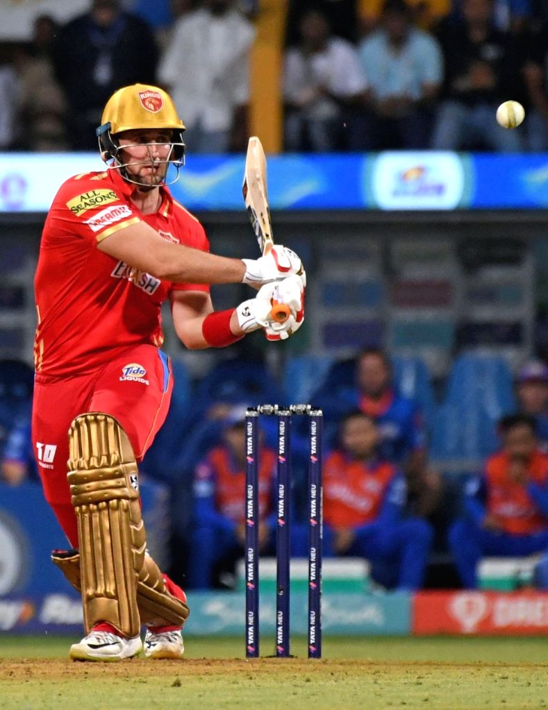 Mumbai : PBKS batsman Liam Livingstone plays a shot