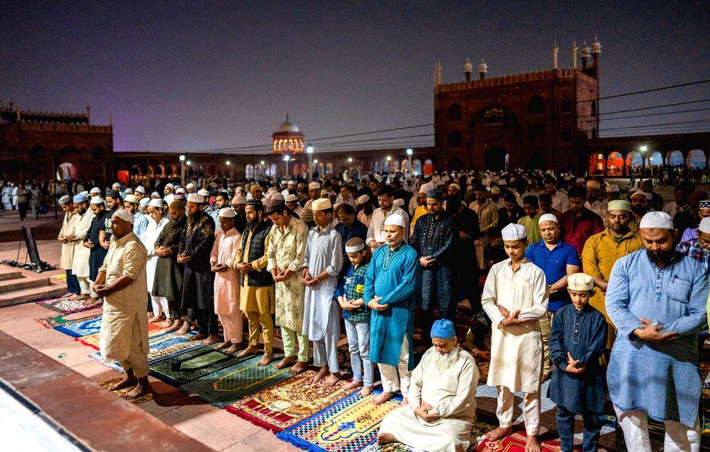 Muslim devotees offer Tarawih prayers to mark the start of the holy ...