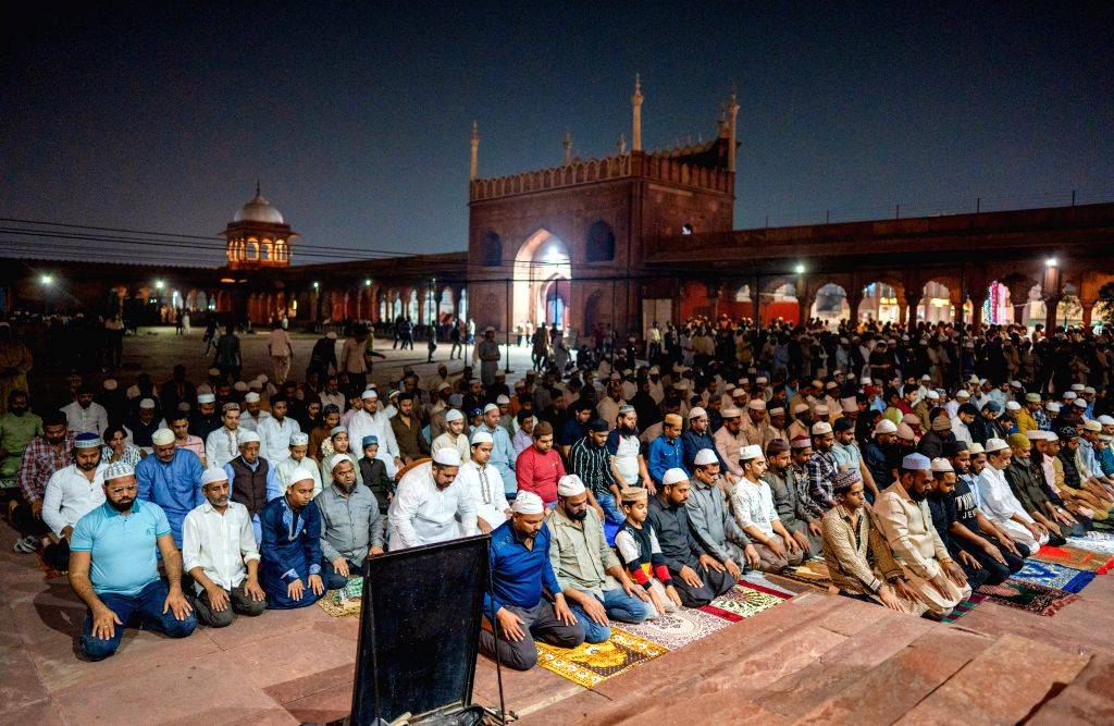 Muslim devotees offer Tarawih prayers to mark the start of the holy ...
