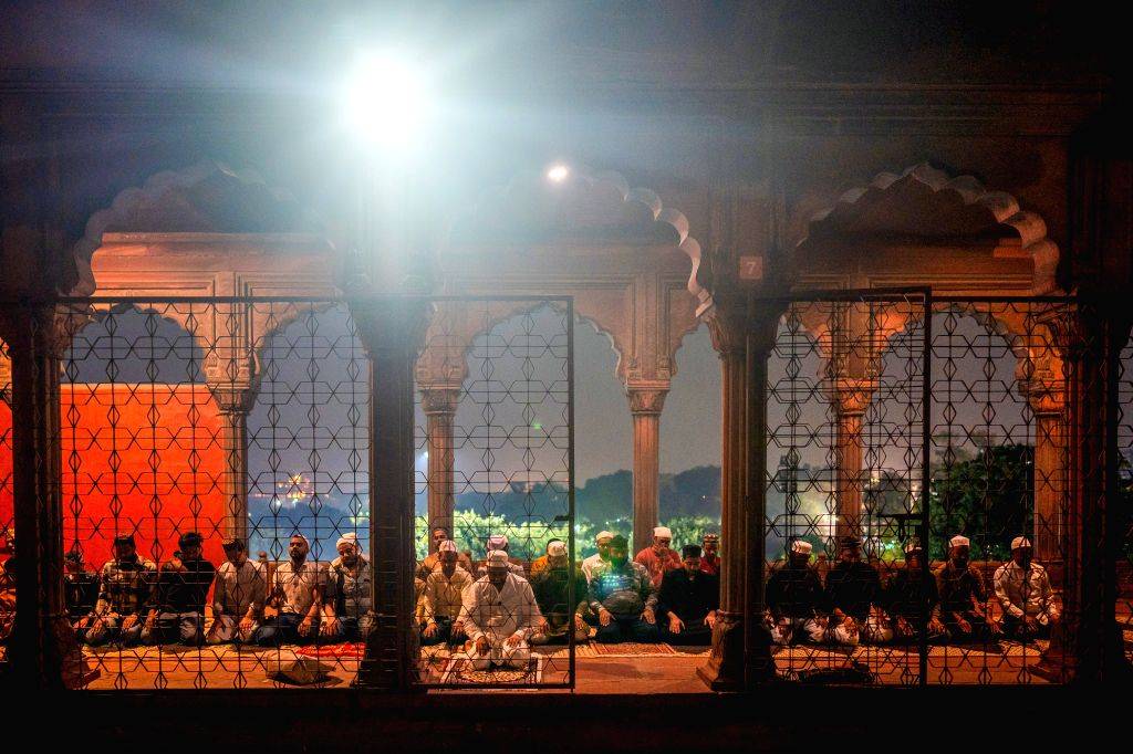 Muslim devotees offer "Tarawih" prayers to mark the start of the holy ...