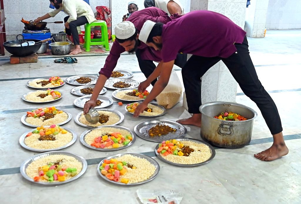 : Agartala: Muslims arrange food for iftar inside a mosque before ...