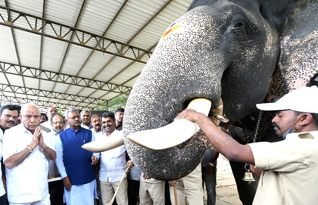 Mysuru : Former Chief Minister and BJP leader BS Yeddiyurappa greets an ...
