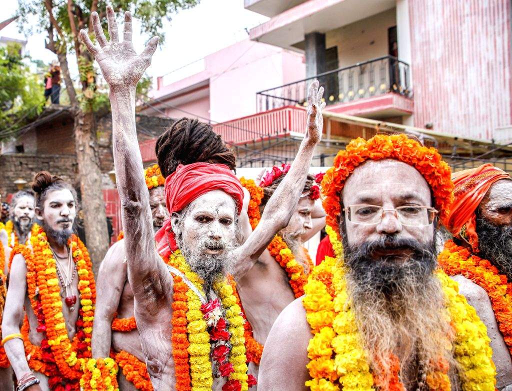Naga Sadhus of Mahanirvani Akhada take part in a religious procession
