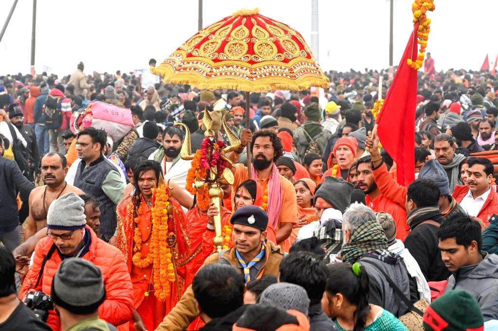 Naga Sadhus proceed towards Sangam Ghat for the 'Amrit Snan