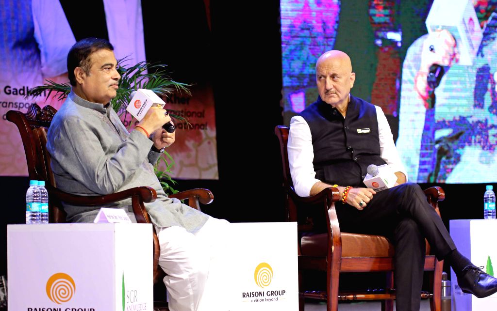Nagpur : Actor Anupam Kher and Union Minister Nitin Gadkari during a G ...