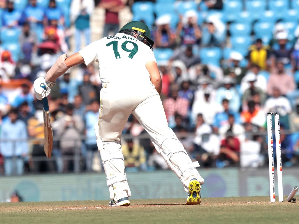 :Nagpur:Australia's Scott Boland is bowled by Ravichandran Ashwin.