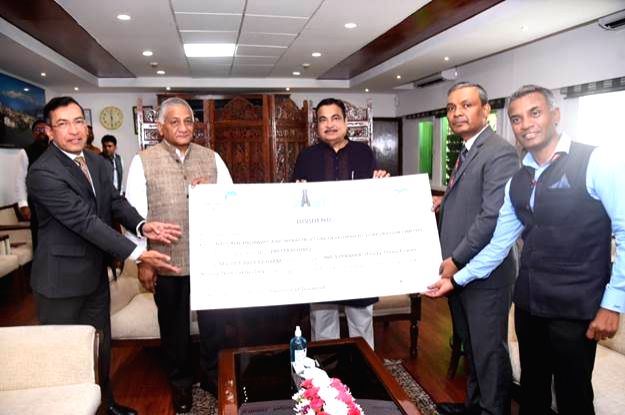 NHIDCL pays dividend cheque of rupees thirty-three crore ninety-nine ...