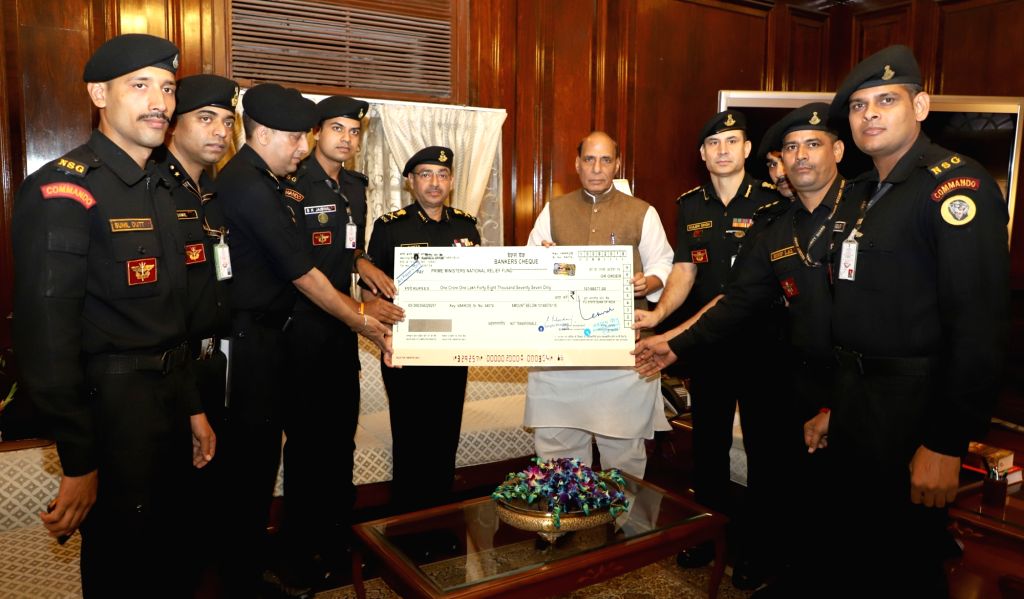 NSG DG presents a cheque to Rajnath Singh contributing to PM's National ...