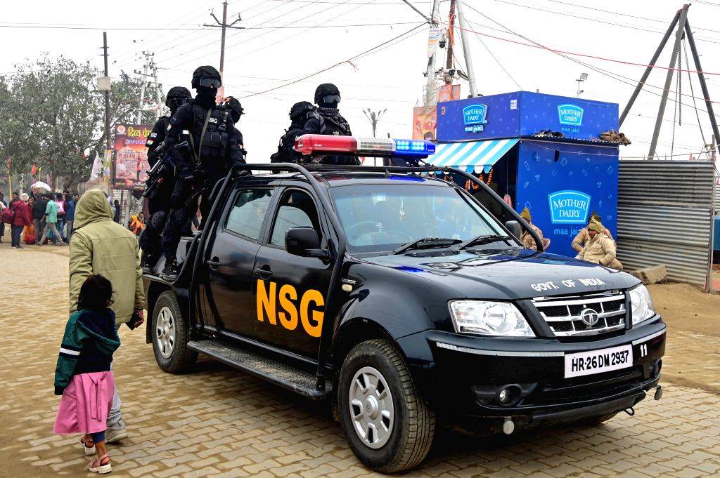 National Security Guard (NSG) personnel patrols along the Triveni Sangam,