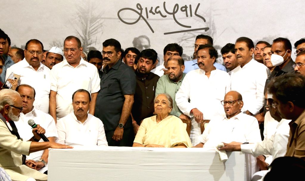 Nationalist Congress Party (NCP) chief Sharad Pawar with his wife and ...
