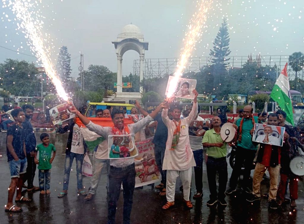 NDA's supporters celebrates in anticipation of the results of ...