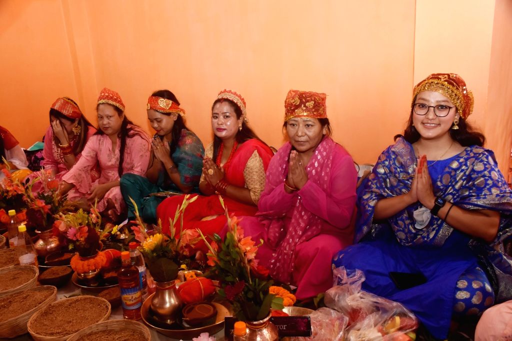 Nepali Hindu women offer prayers during â Kalash Sathpanaâ