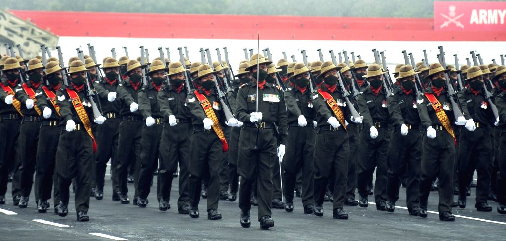 New Delhi:Assam Rifles Contingents passing through saluting dais during ...