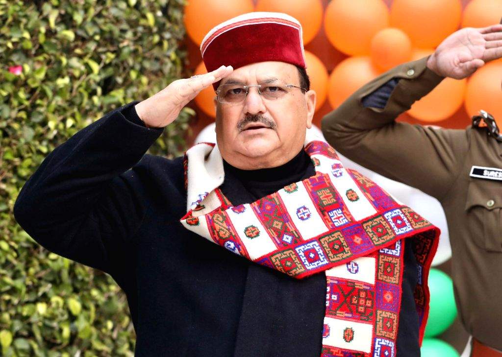 New Delhi : BJP National President JP Nadda salutes after hoisting the ...