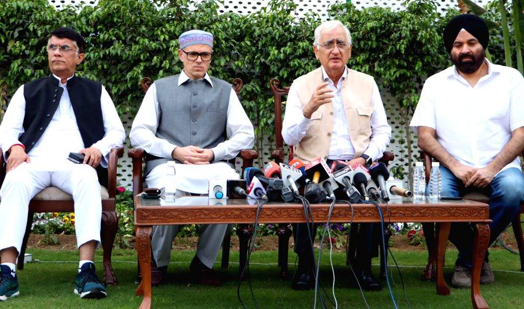 Congress leader Salman Khurshid, Pawan Khera and J&K National ...