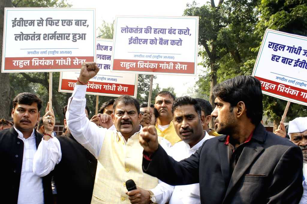 Congress party workers stage a protest against ECI 'The Election ...