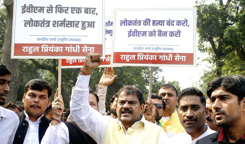 Congress party workers stage a protest against ECI 'The Election ...