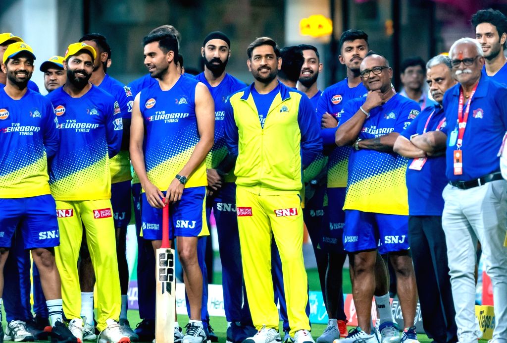 CSK's captain MS Dhoni along with his teammates before the start of the ...