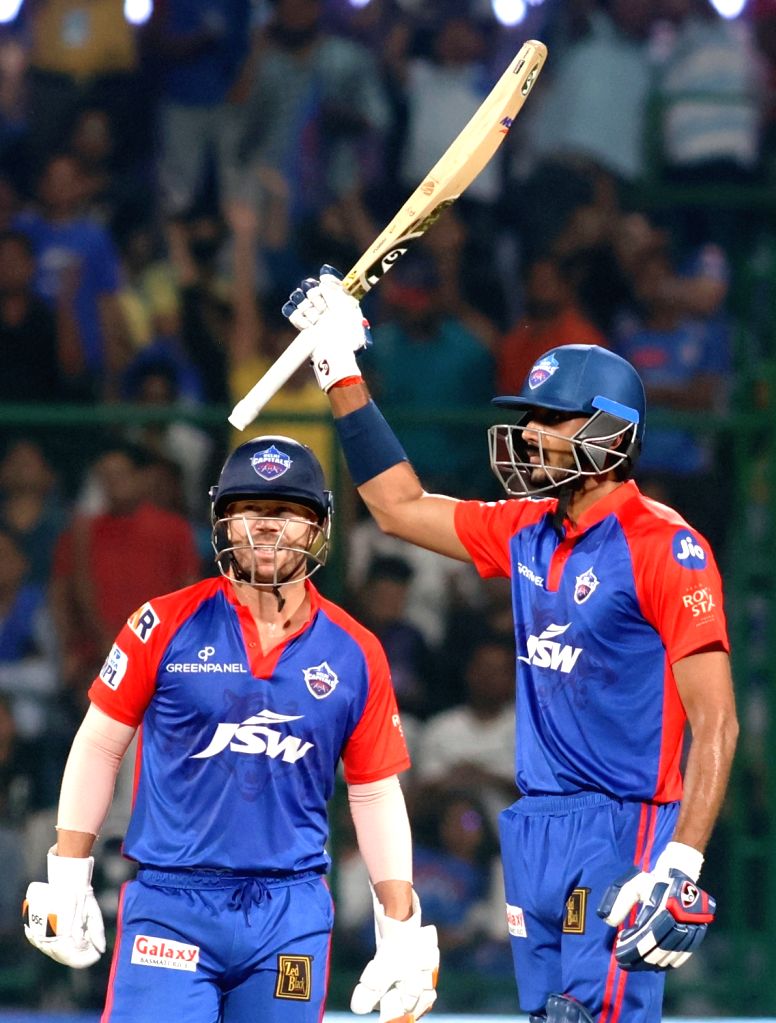 DC batsman Axar Patel celebrates his half-century with team captain ...