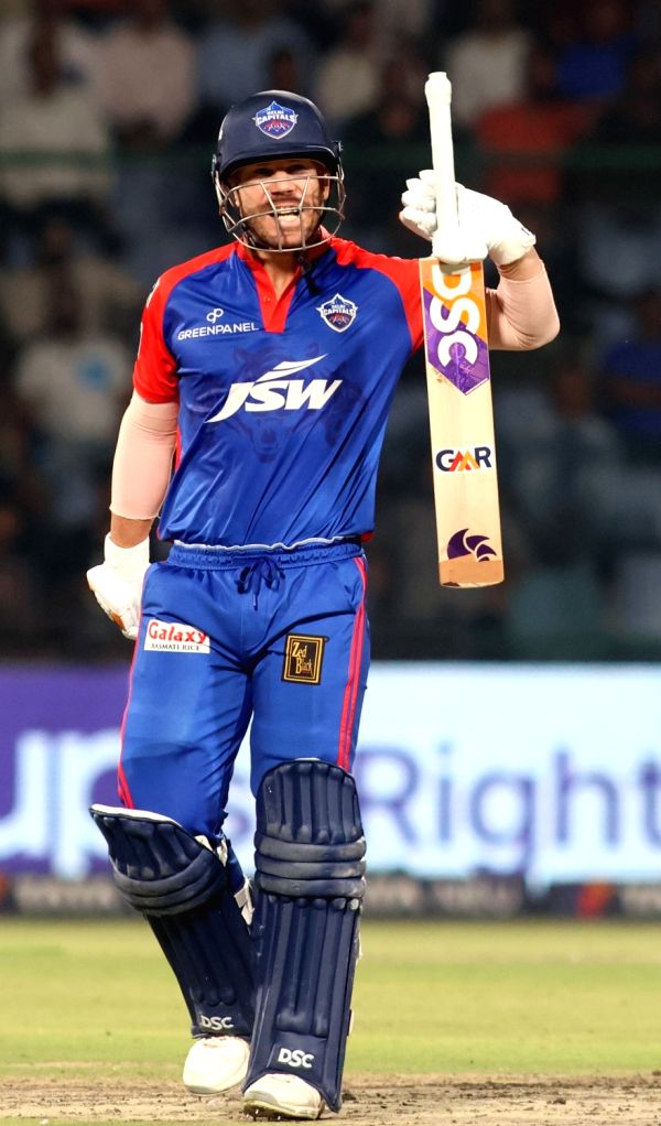DC captain David Warner walks back after losing his wicket