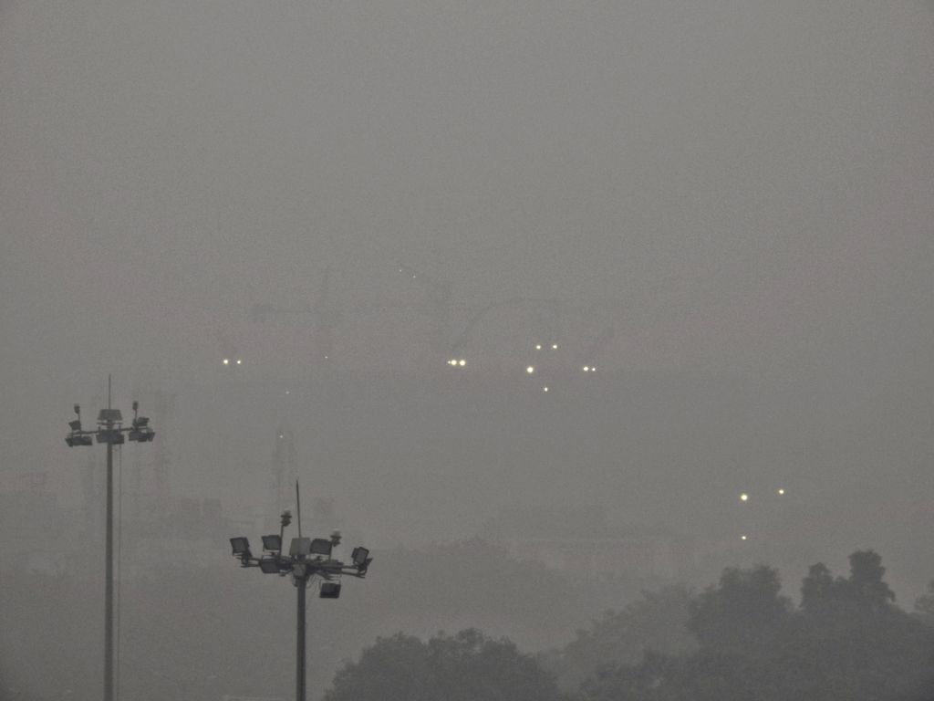 : New Delhi :Haze and smog envelops the skyline.