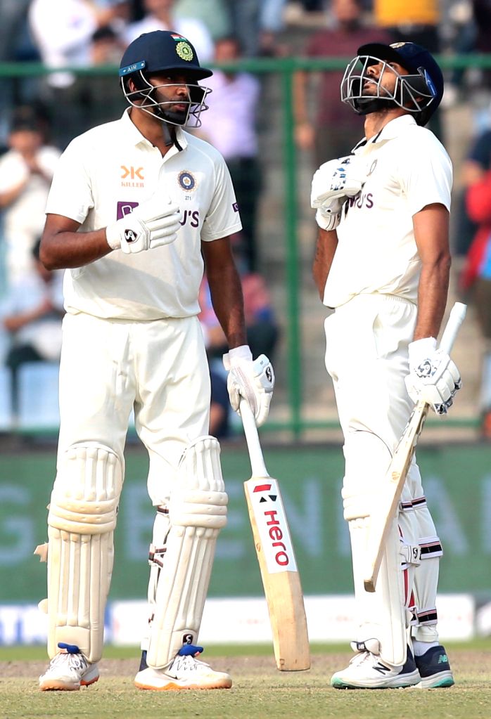 : New Delhi : India's Axar Patel celebrate his half century