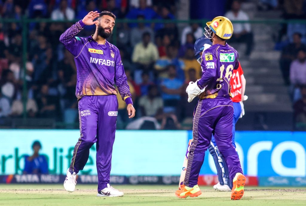 New Delhi : KKR's Varun Chakaravarthy celebrates the dismissal of DC's ...
