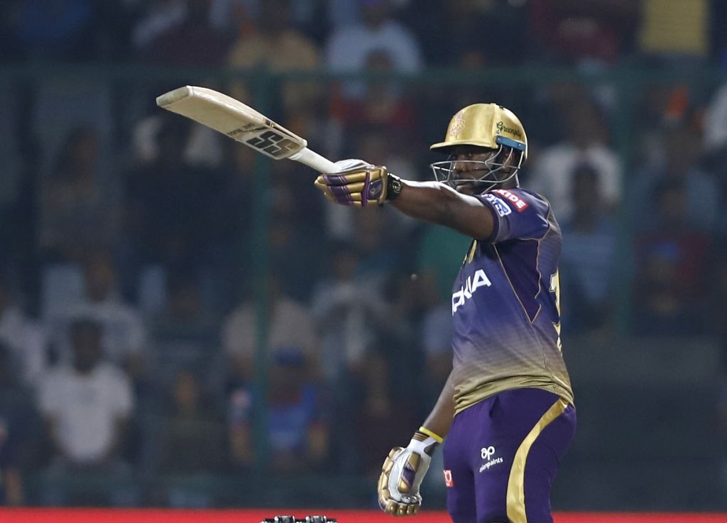 Russell fireworks power KKR to 185/8 against DC