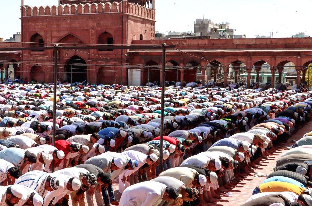New Delhi : Muslim devotees offer first Friday namaz during the holy ...