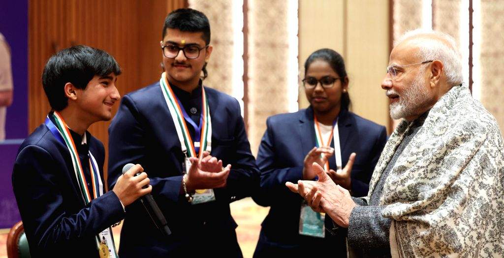 Prime Minister Narendra Modi interacts with Pradhan Mantri Rashtriya ...