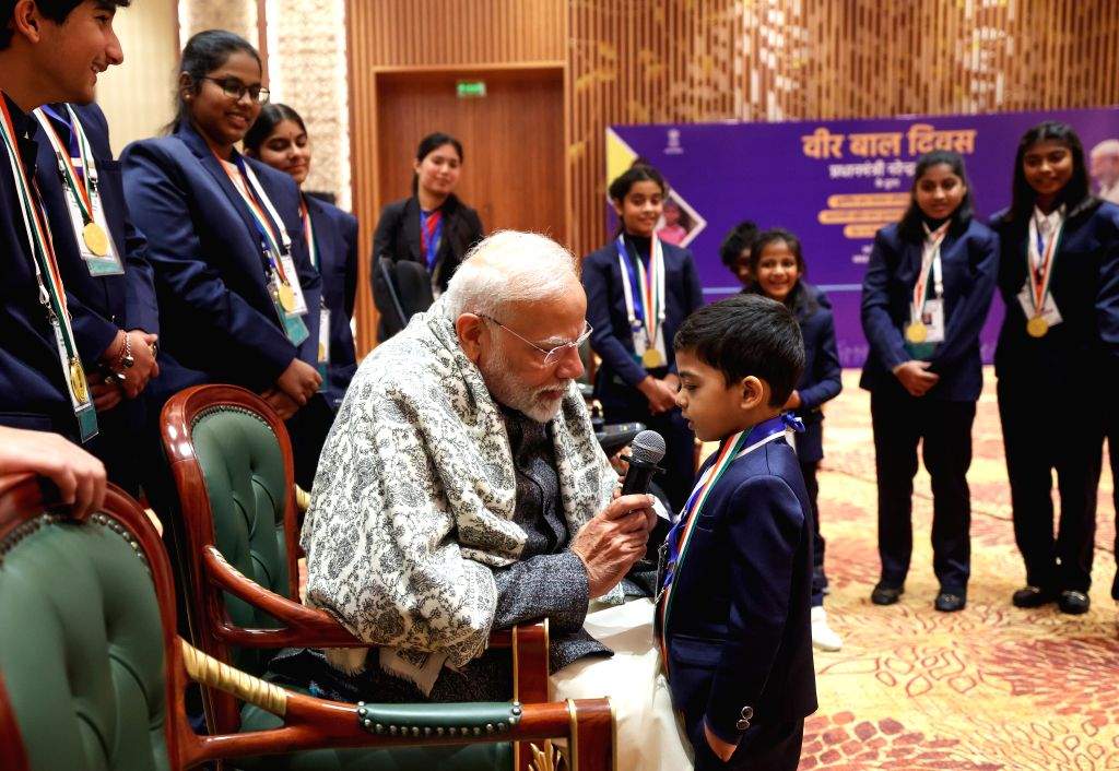 Prime Minister Narendra Modi interacts with Pradhan Mantri Rashtriya ...