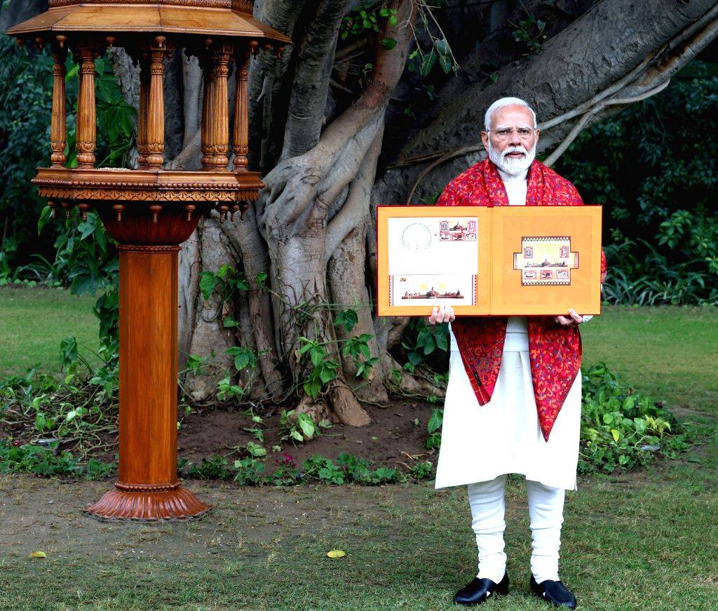 New Delhi : Prime Minister Narendra Modi releases Commemorative Postage ...