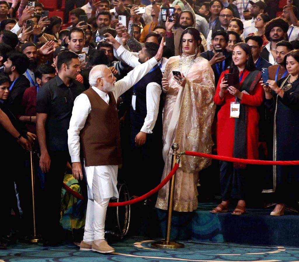 Prime Minister Narendra Modi waves at gathering during the National ...